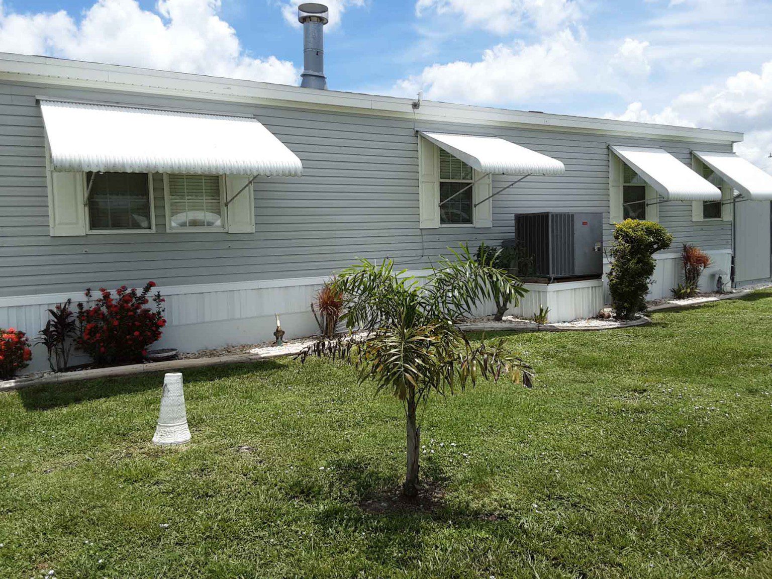 Hurricane Shutters & Clamshell Awnings | Sun Control